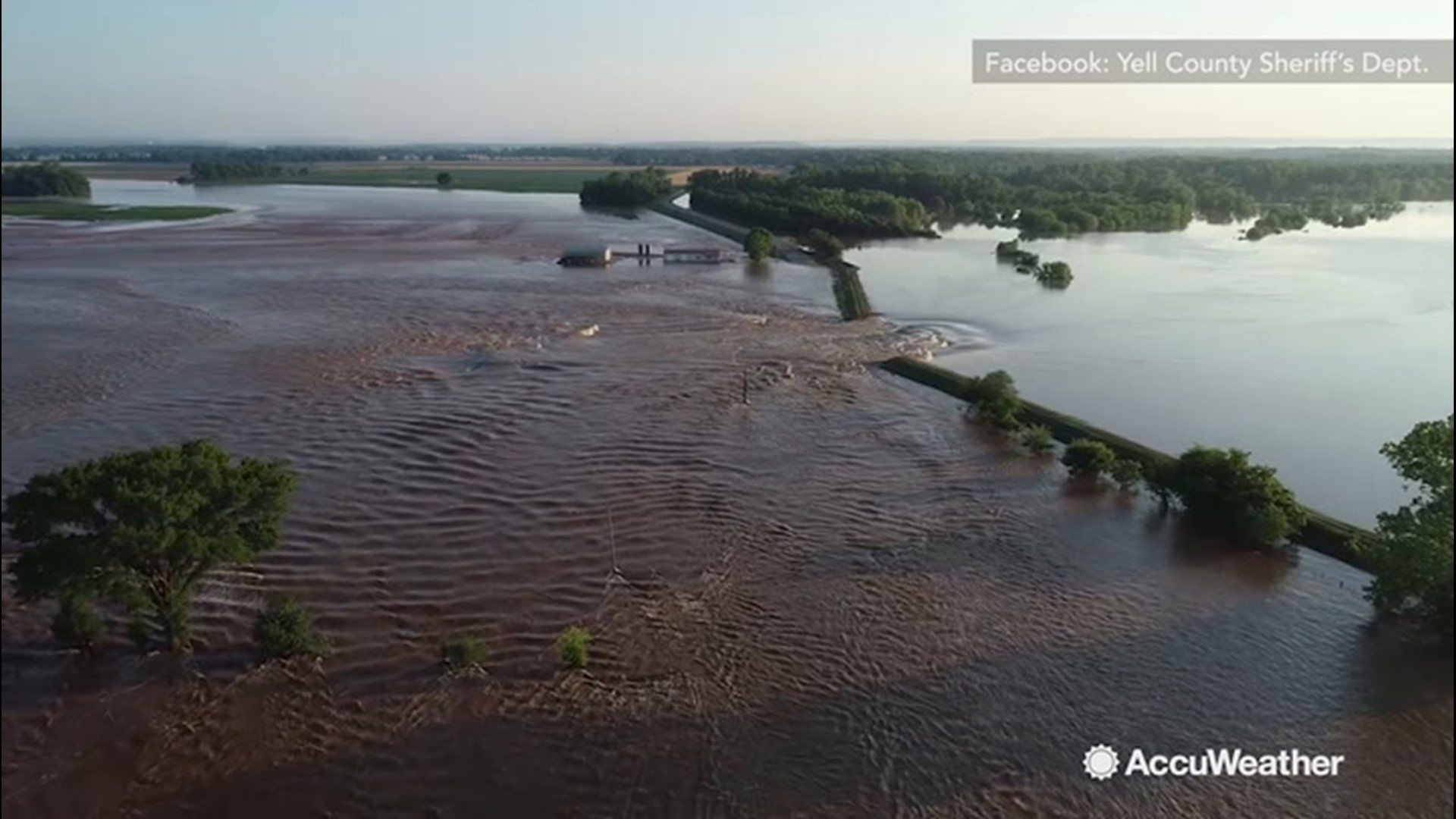 Drone captures water pouring over breached levee | wwltv.com