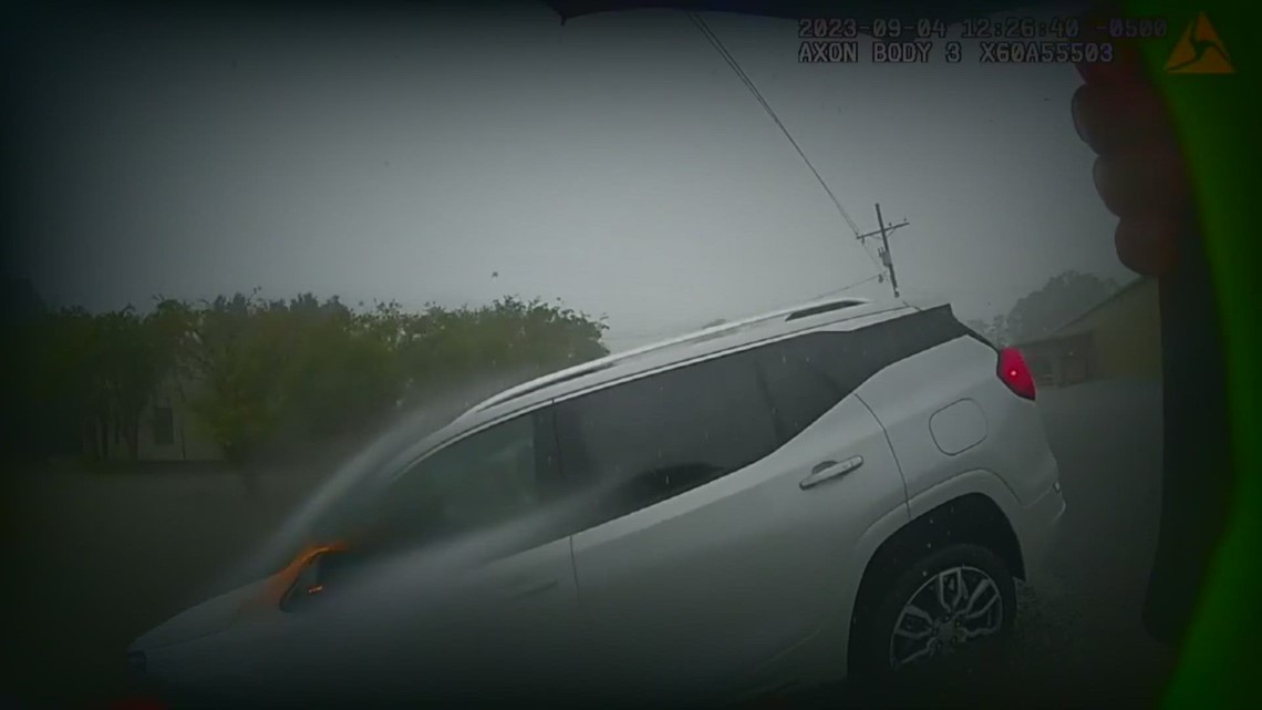 Officer shares story of rescuing trapped driver during flood | wwltv.com