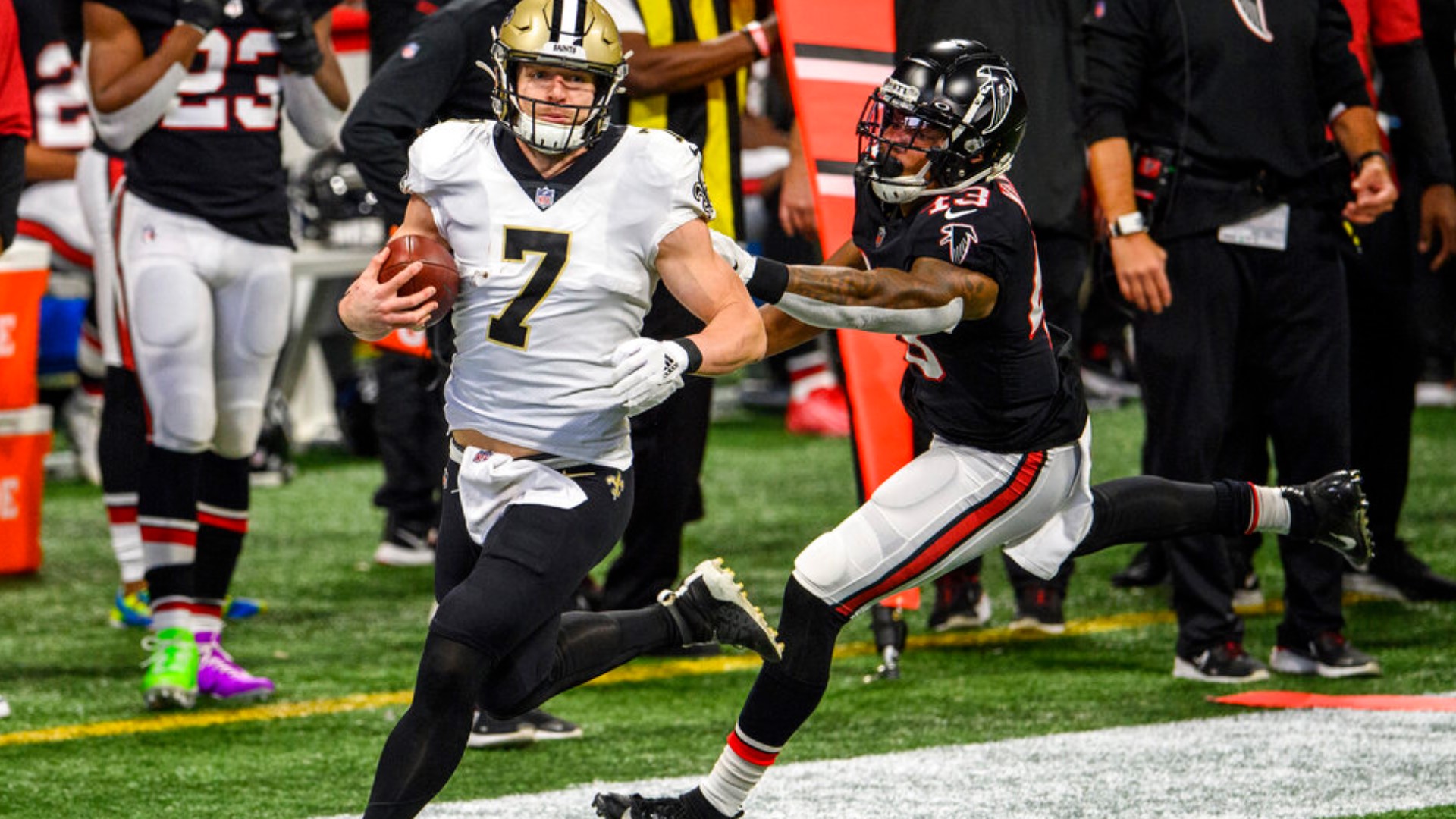 Saints survive late Falcons rally to win 9th straight, clinch playoff ...