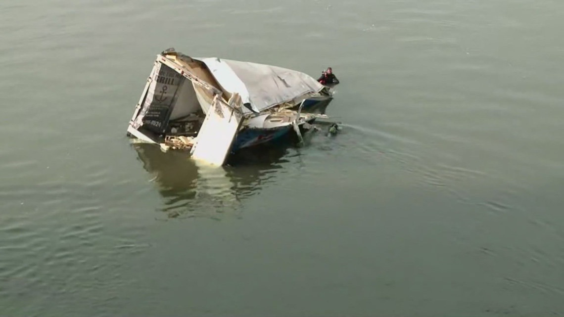 One rescued after 18-wheeler, another vehicle, plunge into Lake ...