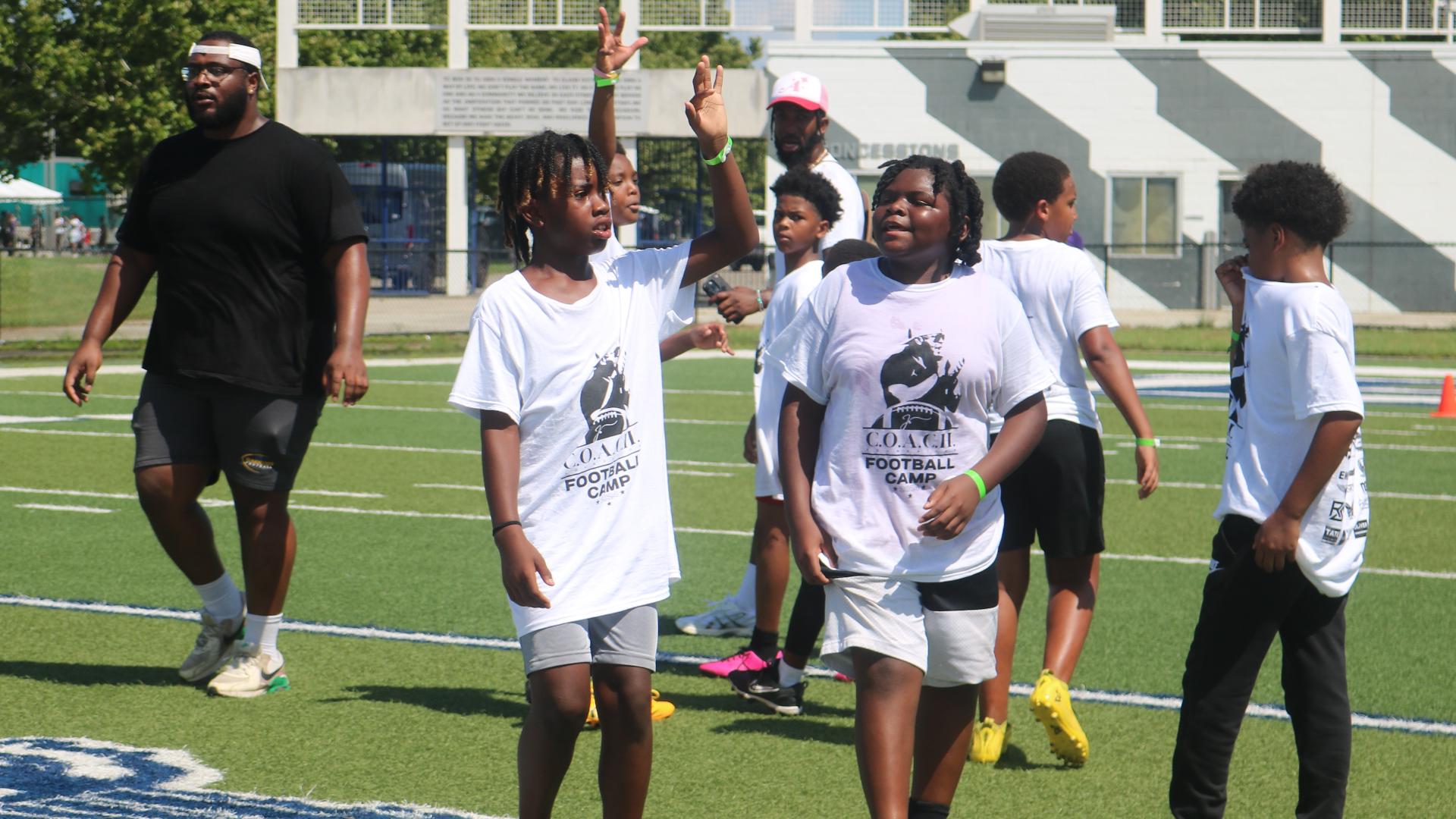 Football camp empowers student athletes and provides resources for a ...