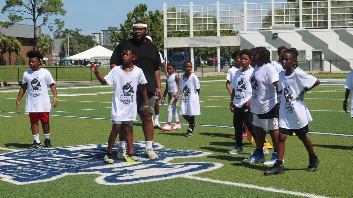 Football camp empowers student athletes and provides resources for a ...
