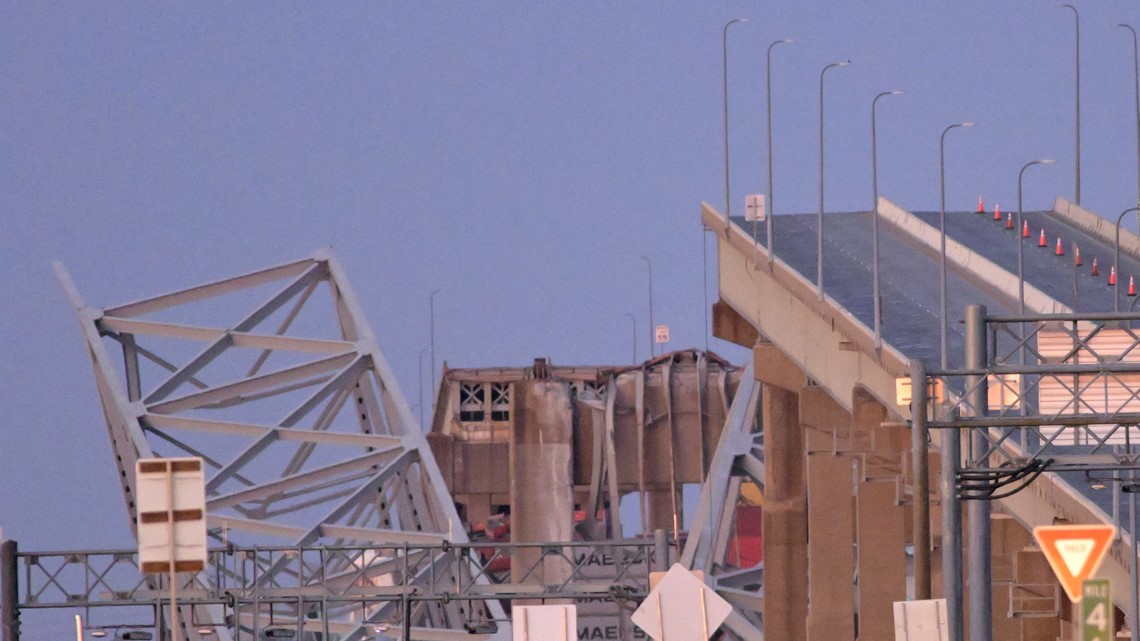 Cargo ship hits Baltimore's Key Bridge, bringing it down. Rescuers are ...