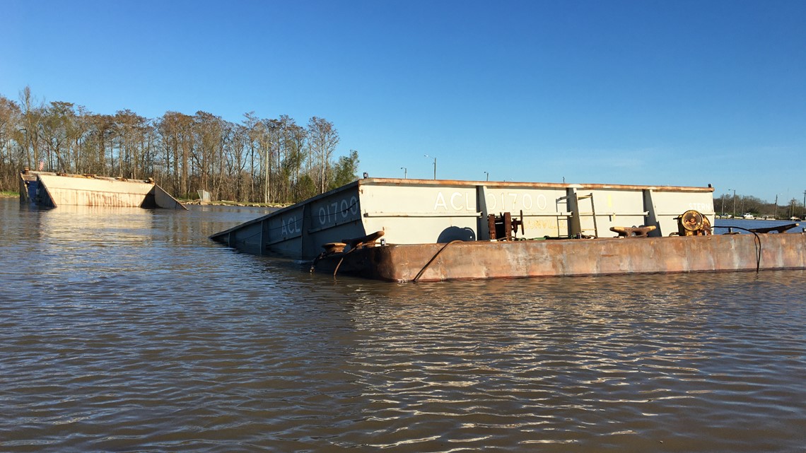 Barge runs aground, falls apart, stopping tugboat traffic | wwltv.com