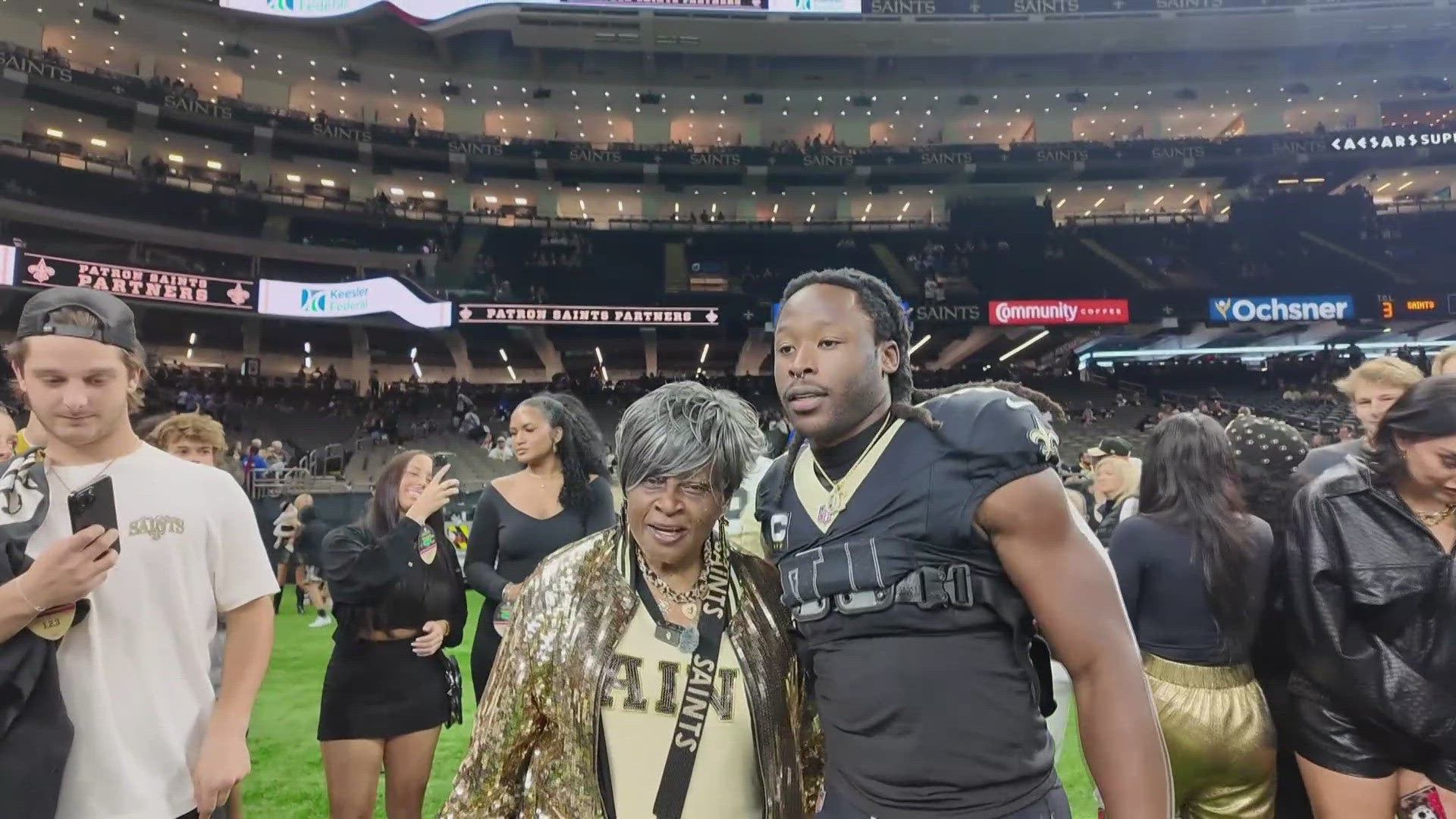‘Mama T’ meets Alvin Kamara at her first-ever Saints game after viral ...