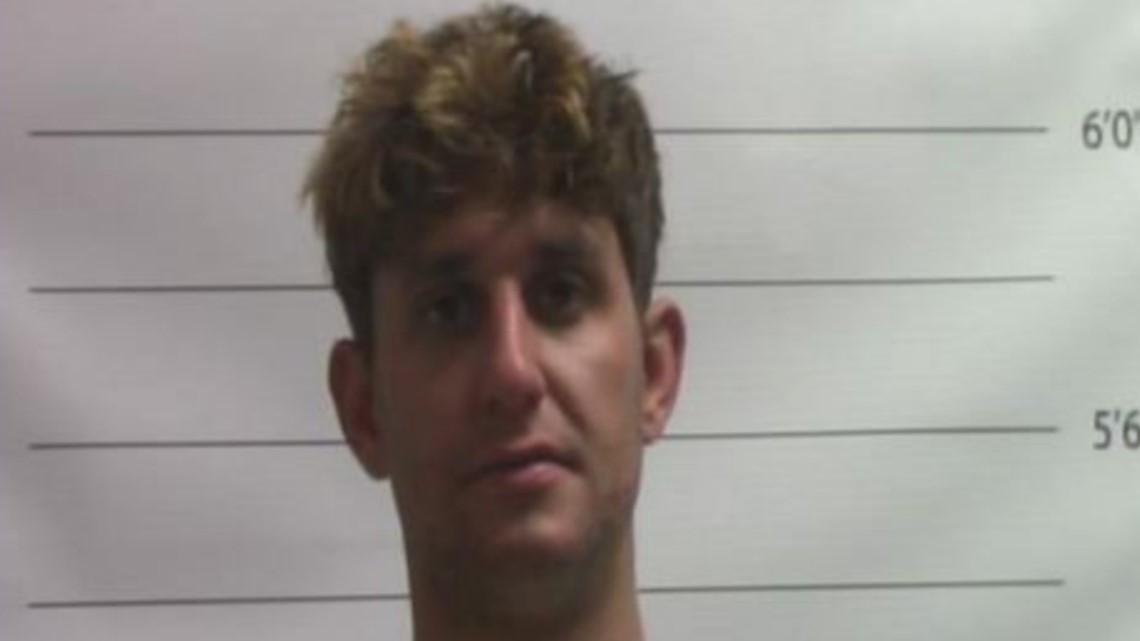 Man arrested after trying to climb wall into jail | wwltv.com