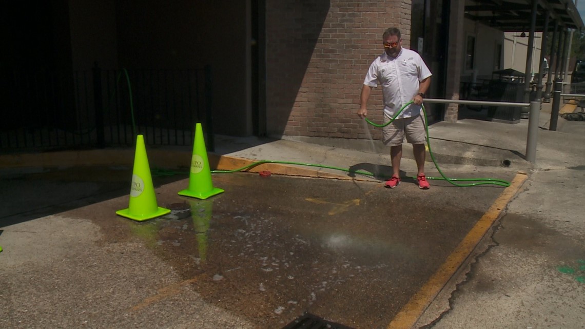 Raw sewage spilling out in front of businesses in Lakeview strip mall ...