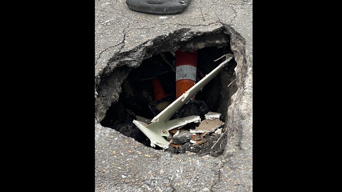 New Orleans sinkhole swallows debris, cones and cars | wwltv.com