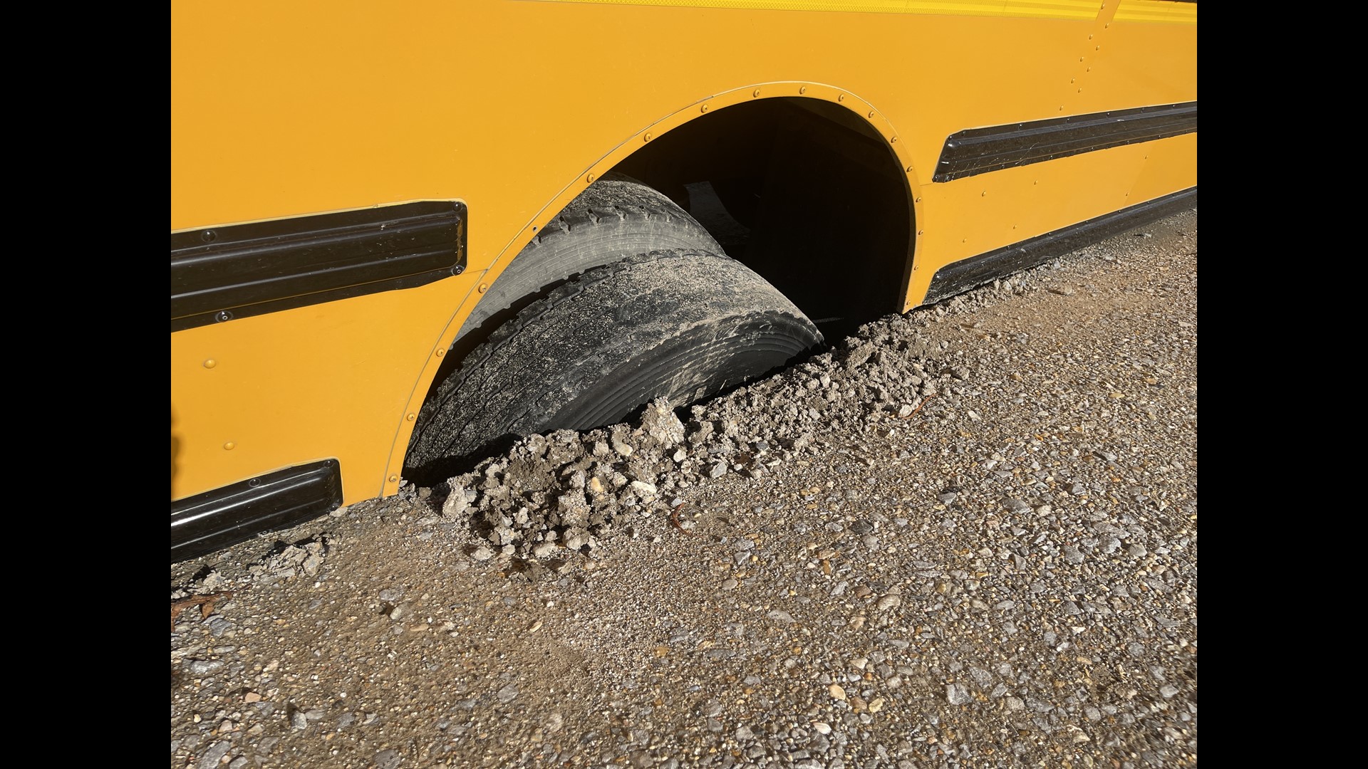 School bus with students got stuck in a pothole Tuesday and then it ...