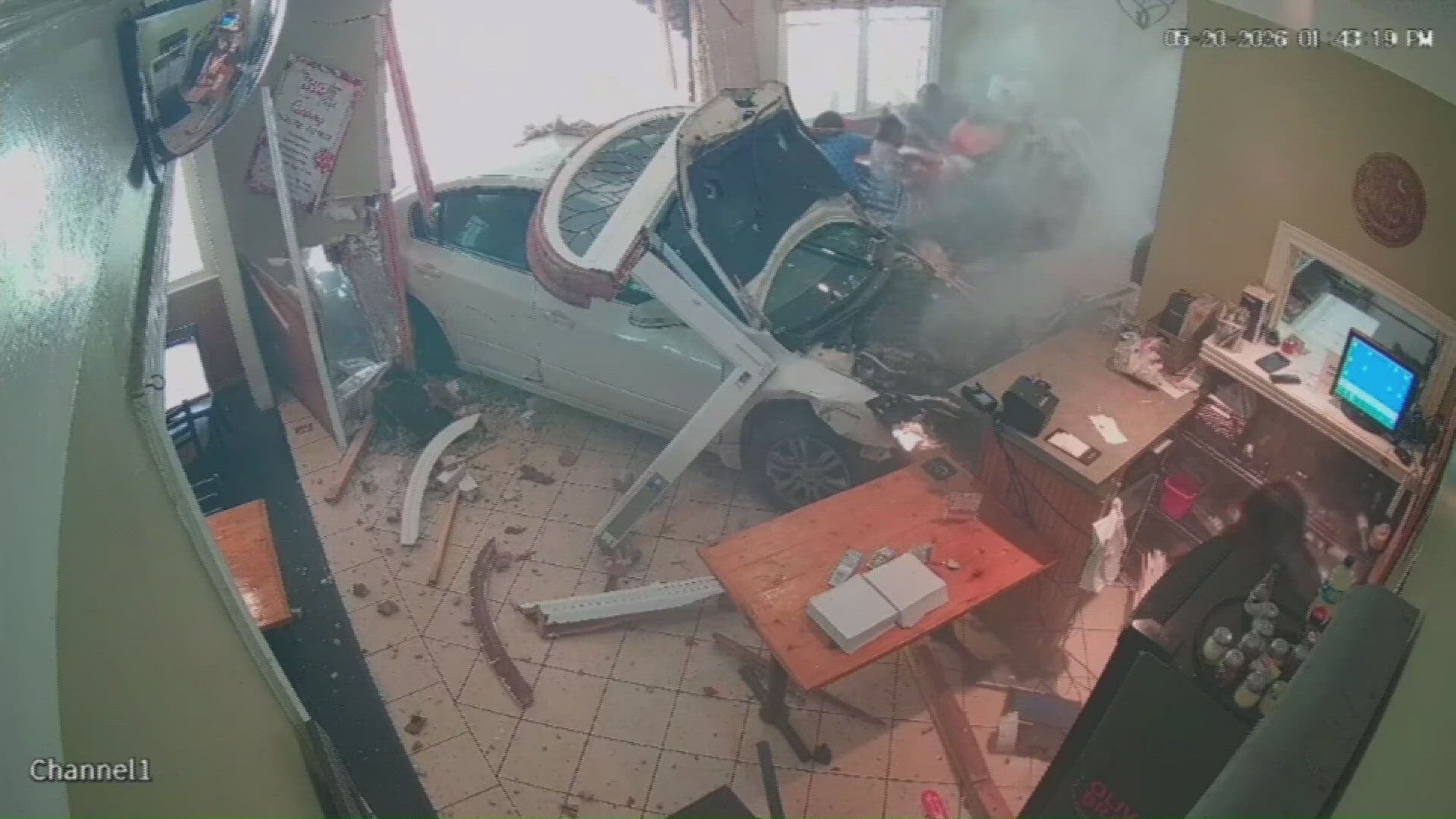 'I could feel the building shake': Owner reacts after car crashes into ...