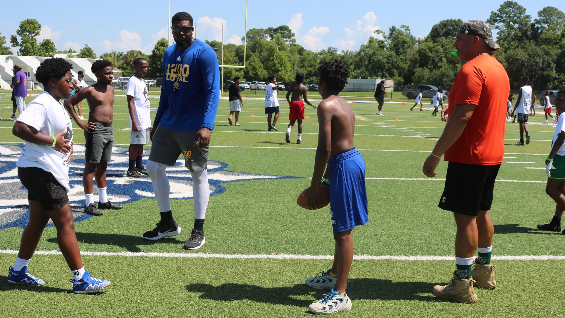 Football camp empowers student athletes and provides resources for a ...